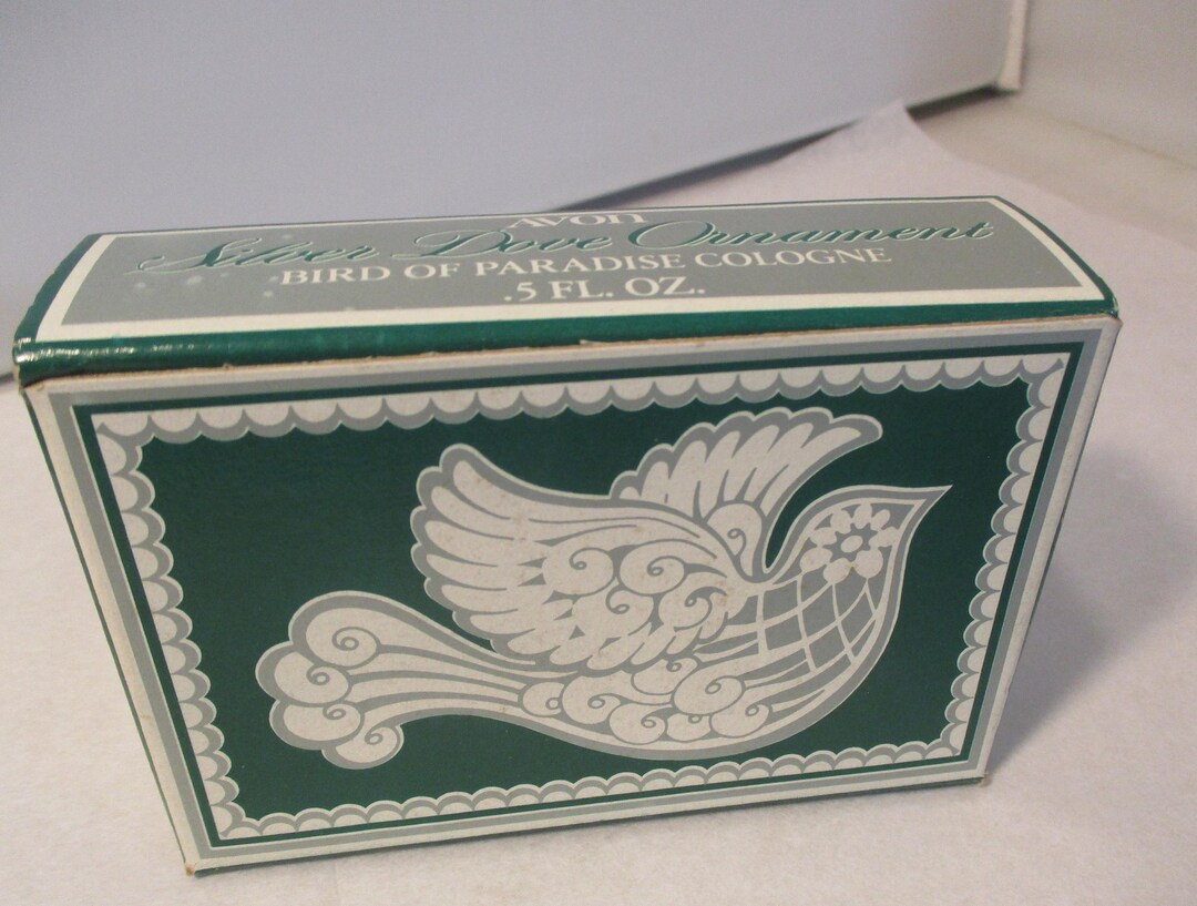 Vintage 1970's Avon Bird of Paradise Cologne and Silver Dove Ornament ...
