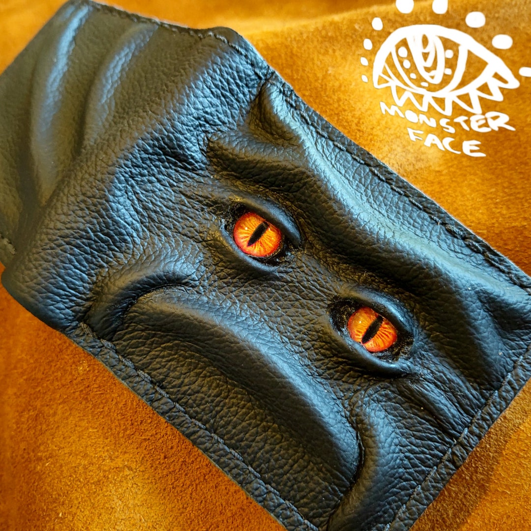 Amber Glum Schmuggle Face Leather Wallet - Necromonicon - Demon Eyes ...