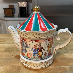 SADLER Circus Carousel Teapot Fiesta PACIFIC RIM Cabana Striped Cake ...