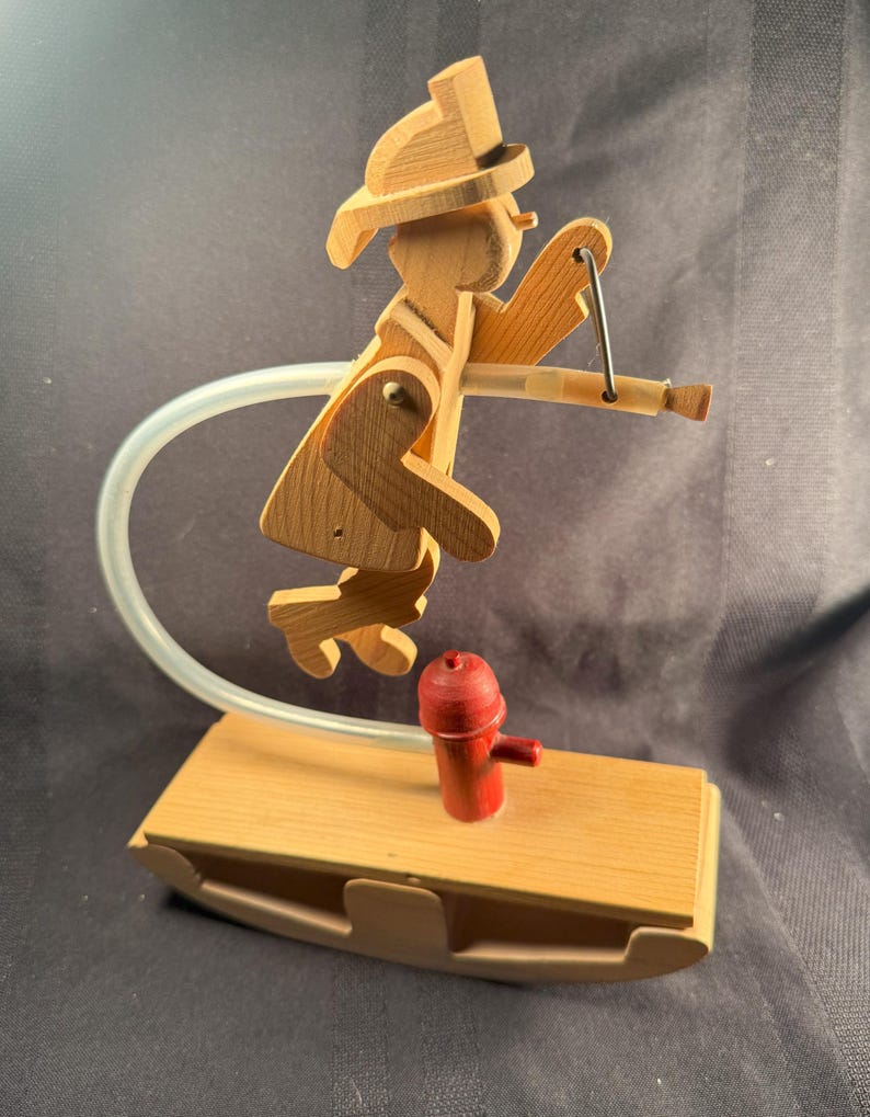 Handcrafted Wooden Firefighter Figurine With Hose and Hydrant Unique ...