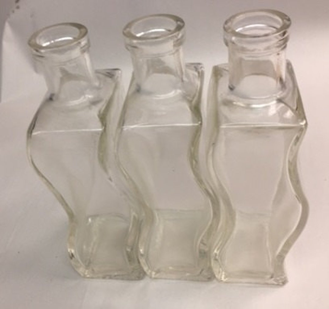 Vintage Nesting Glass Bottles - Etsy