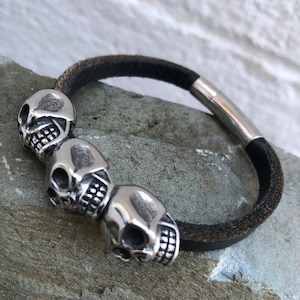 Men s skulls Leather Bracelet Men s Silver Stainless Steel Skull Black Leather Bracelet Men s Stainless Steel Magnetic Clasp Bracelet Etsy UK