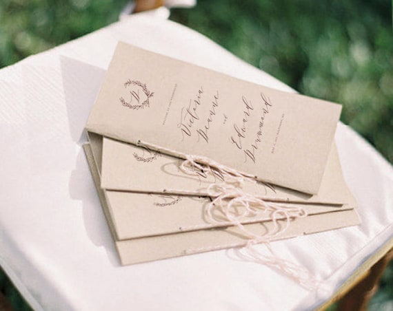 Bi fold wedding program paper | Beachweddingtips.com