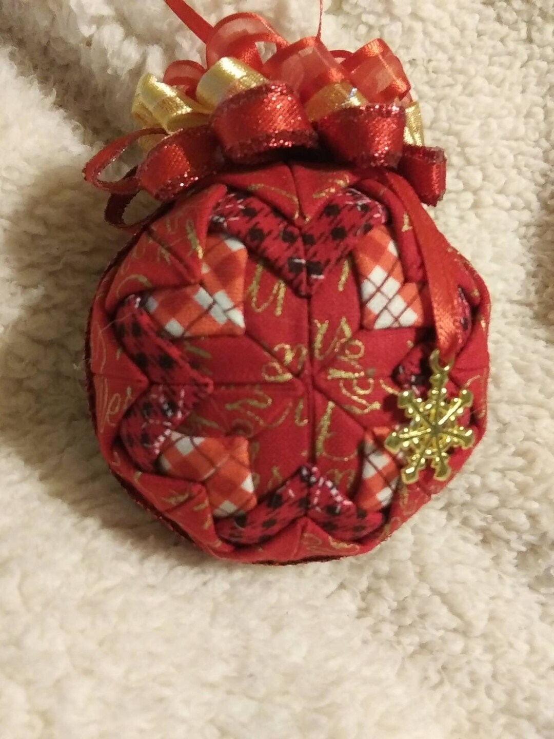 Red Fabrics Folded Star Ball Ornament With a Gold Tone Snowflake Charm ...