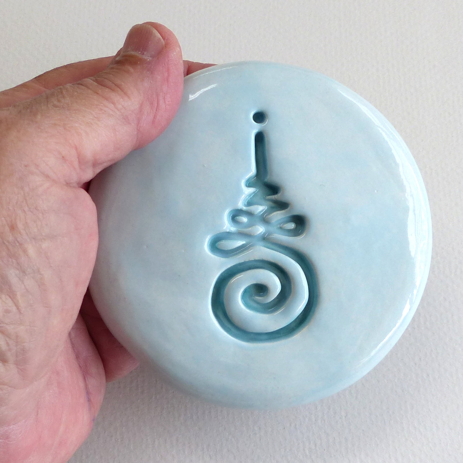 Handmade Clay Unalome: Buddhist Symbol Gift - Etsy