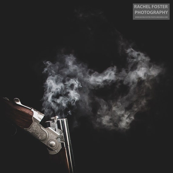 Gun Smoke Black Background