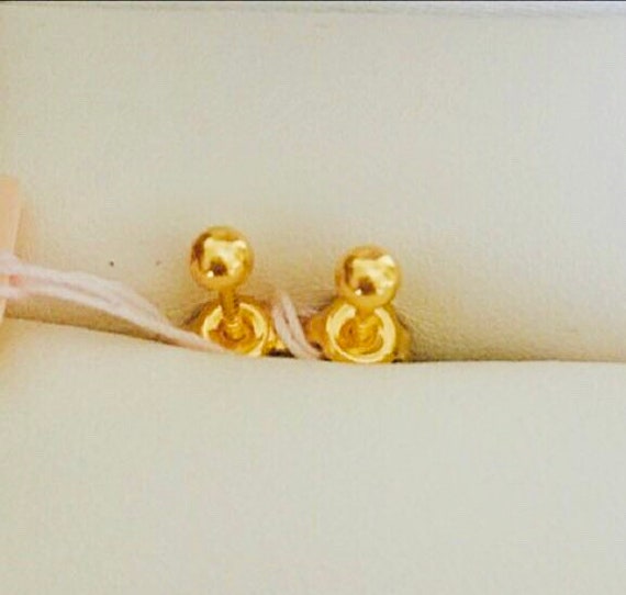 916 gold stud earrings store