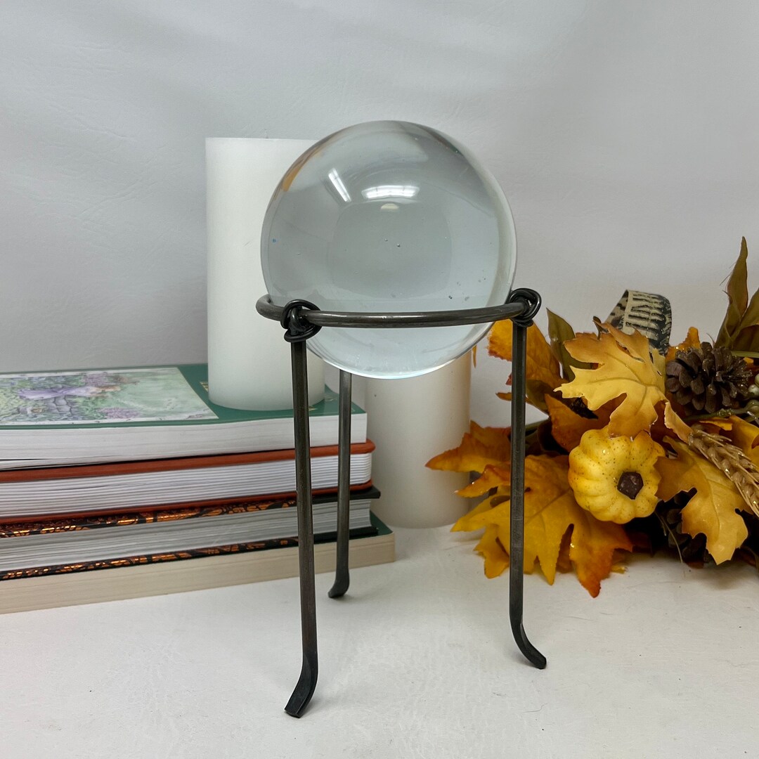Brown and Gray Metal Sphere Holder With Three Legs and Decorative Metal ...