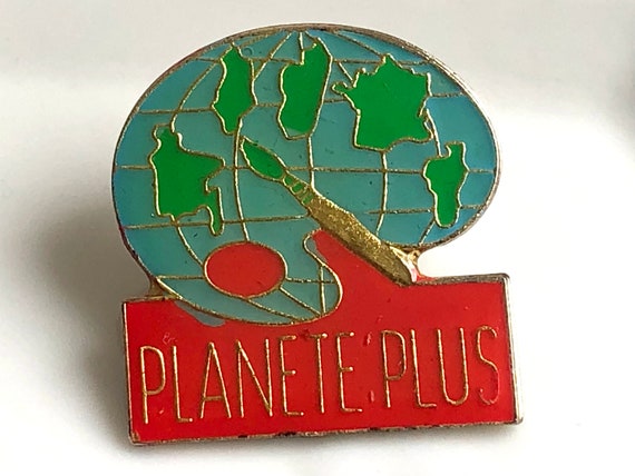 Planet Earth pin, with "Planete plus" ribbon, paint p… - Gem