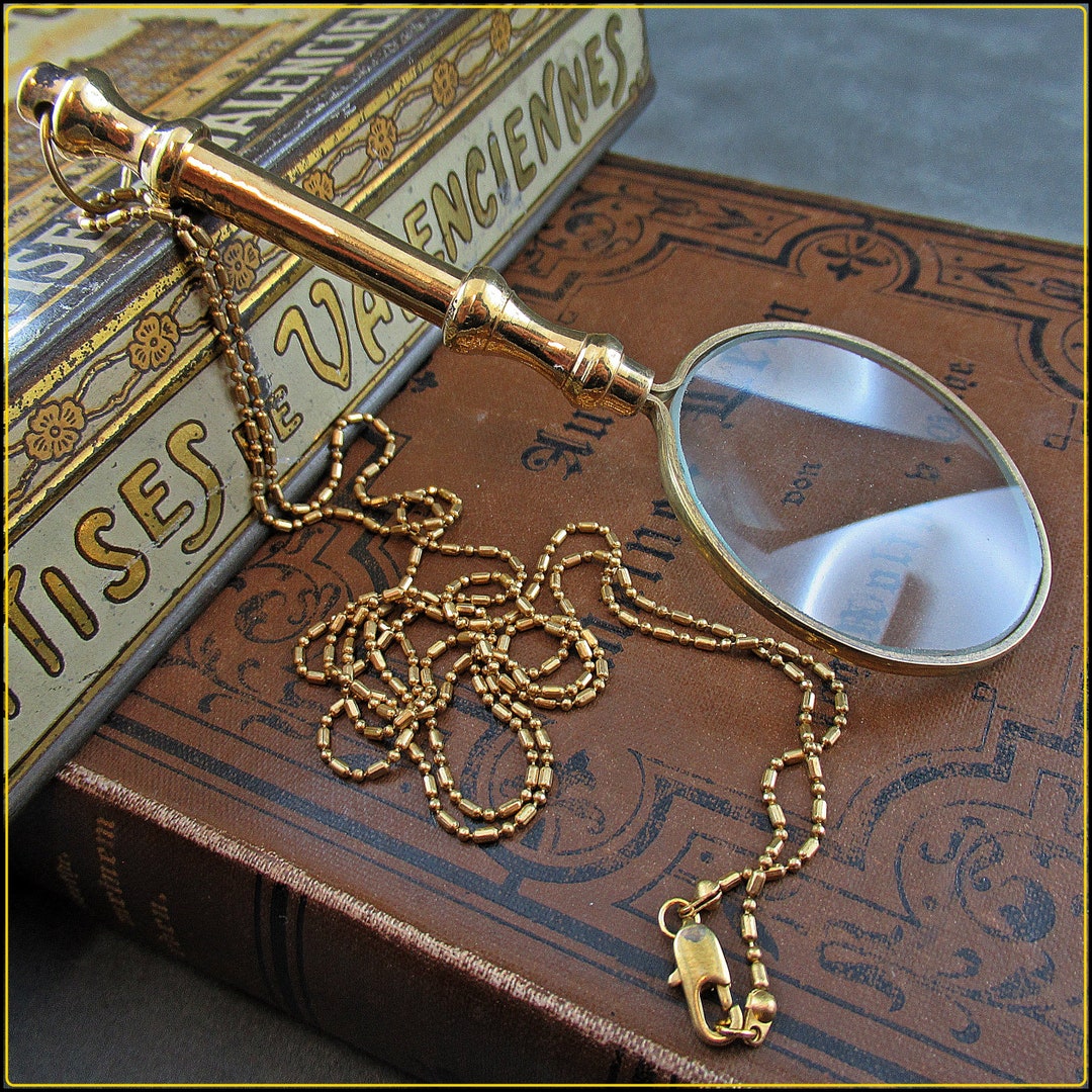 Beautiful Classic Golden Magnifying Glass With Long Handle on the Chain ...