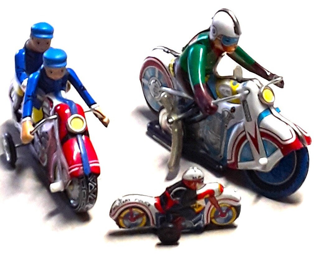Three Vintage Tin Lithograph Motorcycles with Riders, One Two-rider Toy ...