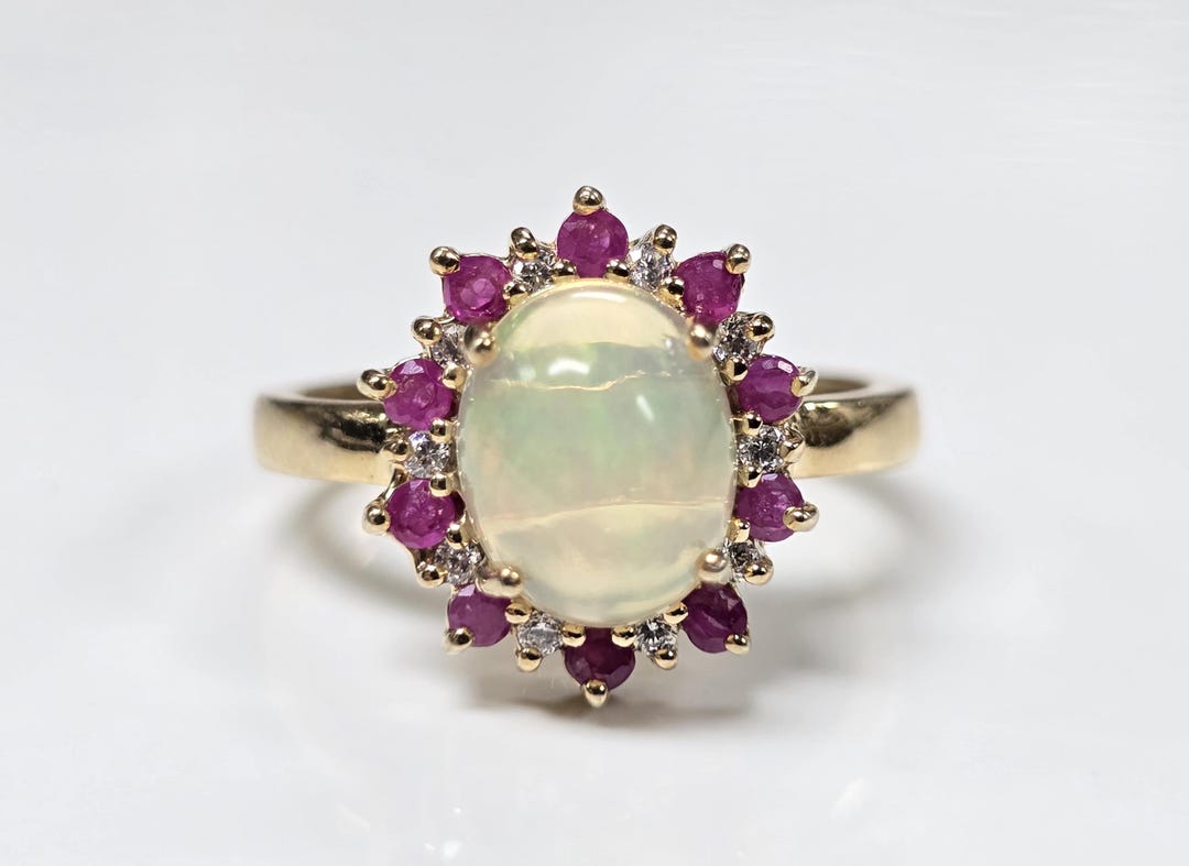 Stauer Gold Plated Sterling Silver Opal Rubies and White Topaz Halo ...