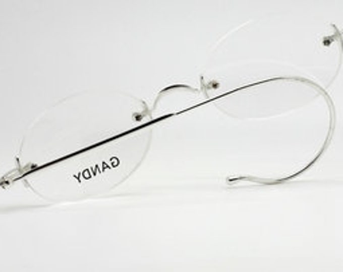 Oval Rimless Spectacles With the Added Advantage of Saddle Bridge and ...