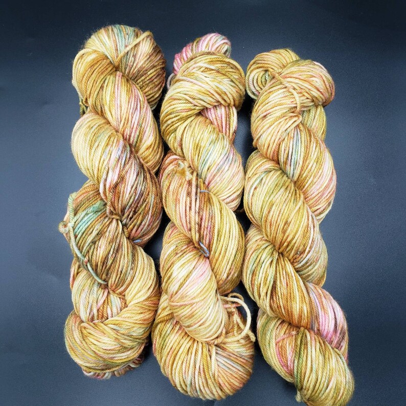 Hand Dyed Yarn in Rose Gold Patina | Etsy