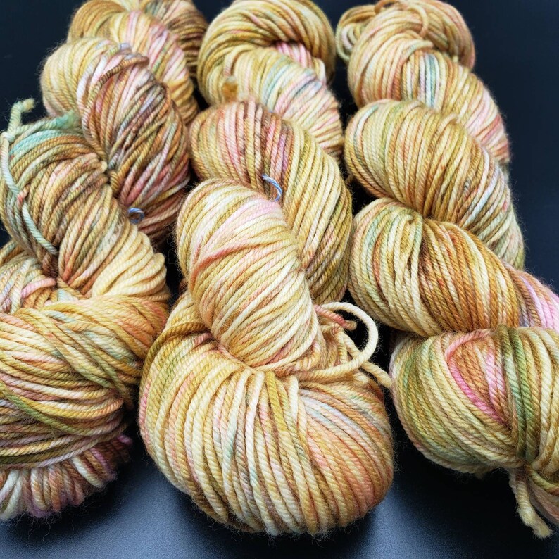 Hand Dyed Yarn in Rose Gold Patina | Etsy