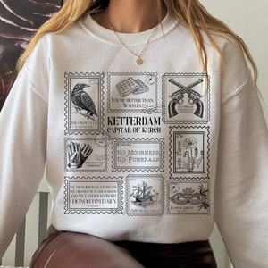 Six of Crows Stamp Collection Crewneck Sweatshirt * Crow Club Kaz Inej ...