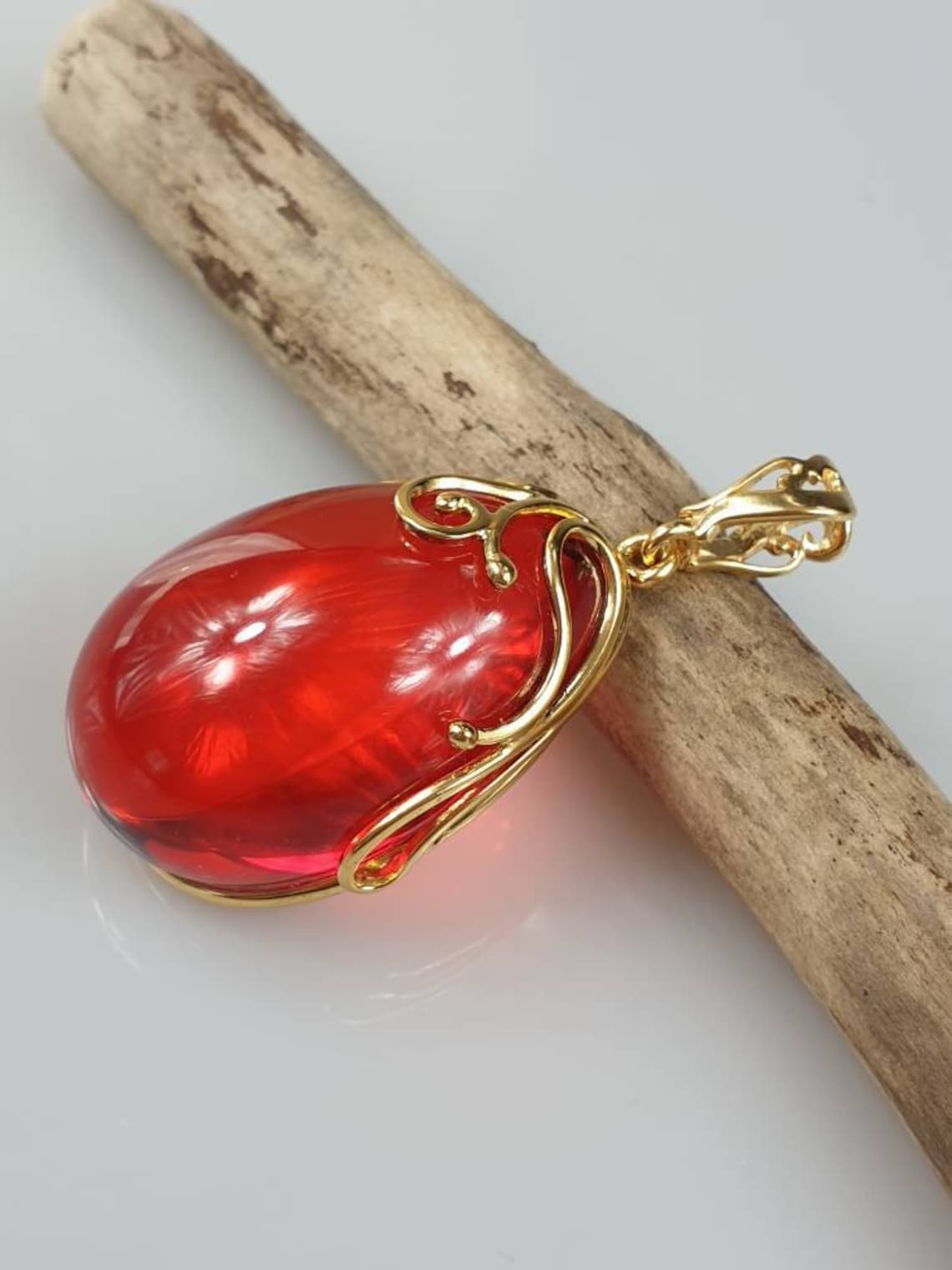 Ruby red Amber pendant. Gold plated silver cabochon. Deep red | Etsy