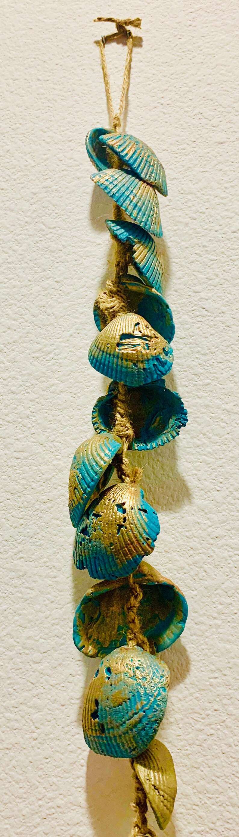 Sea shell garland rustic worn shells bronze patina blue | Etsy