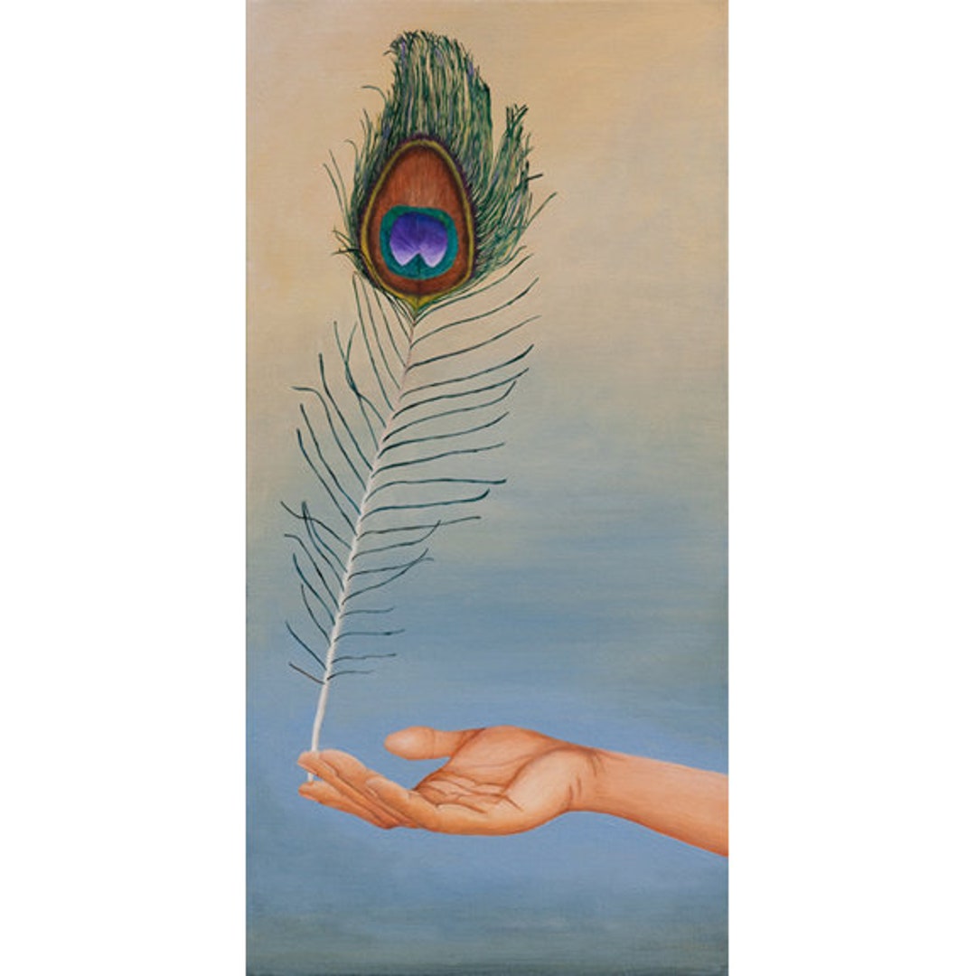THE NATURE of BALANCE- a Peacock Feater Balanced on the Finger of a ...