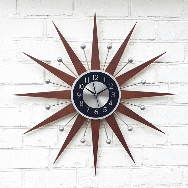Silver Starburst Wall Clock - Etsy