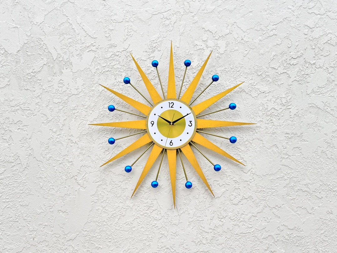 252730 Atomic Wall Clocks 70s Light Blue Ball Starburst Clock George ...