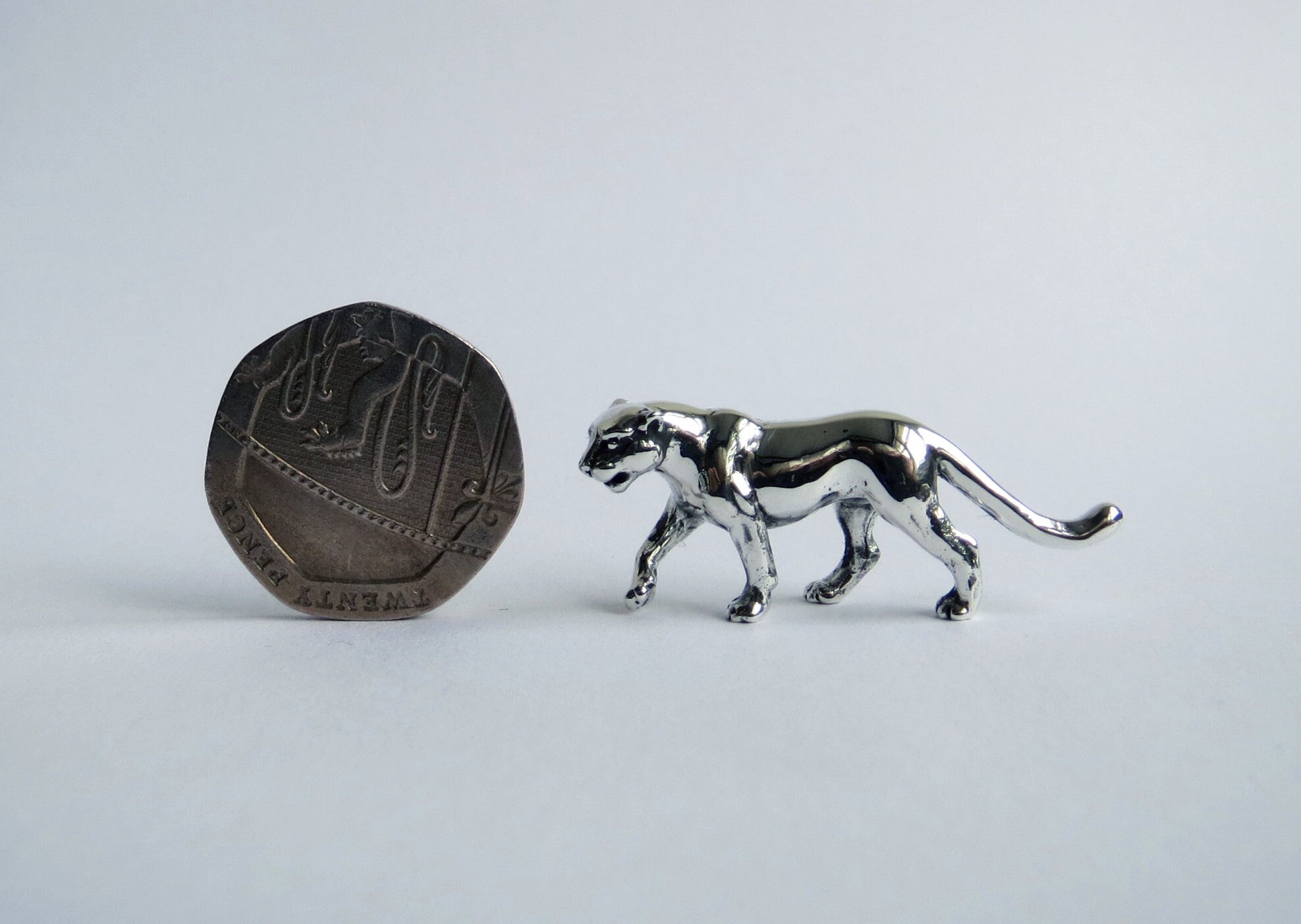 Tiny panther or leopard figurine silver | Etsy