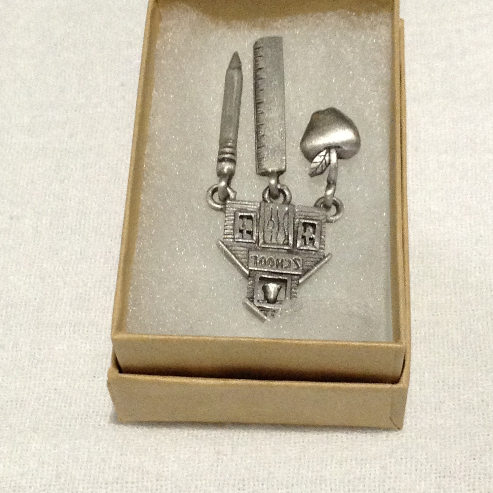 Signed JJ schoolhouse clutch pin with 3 charms apple ruler | Etsy