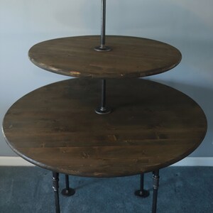 Round Industrial Pipe and Wood Clothing Store Boutique Shop Display ...