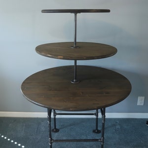 Round Industrial Pipe and Wood Clothing Store Boutique Shop Display ...