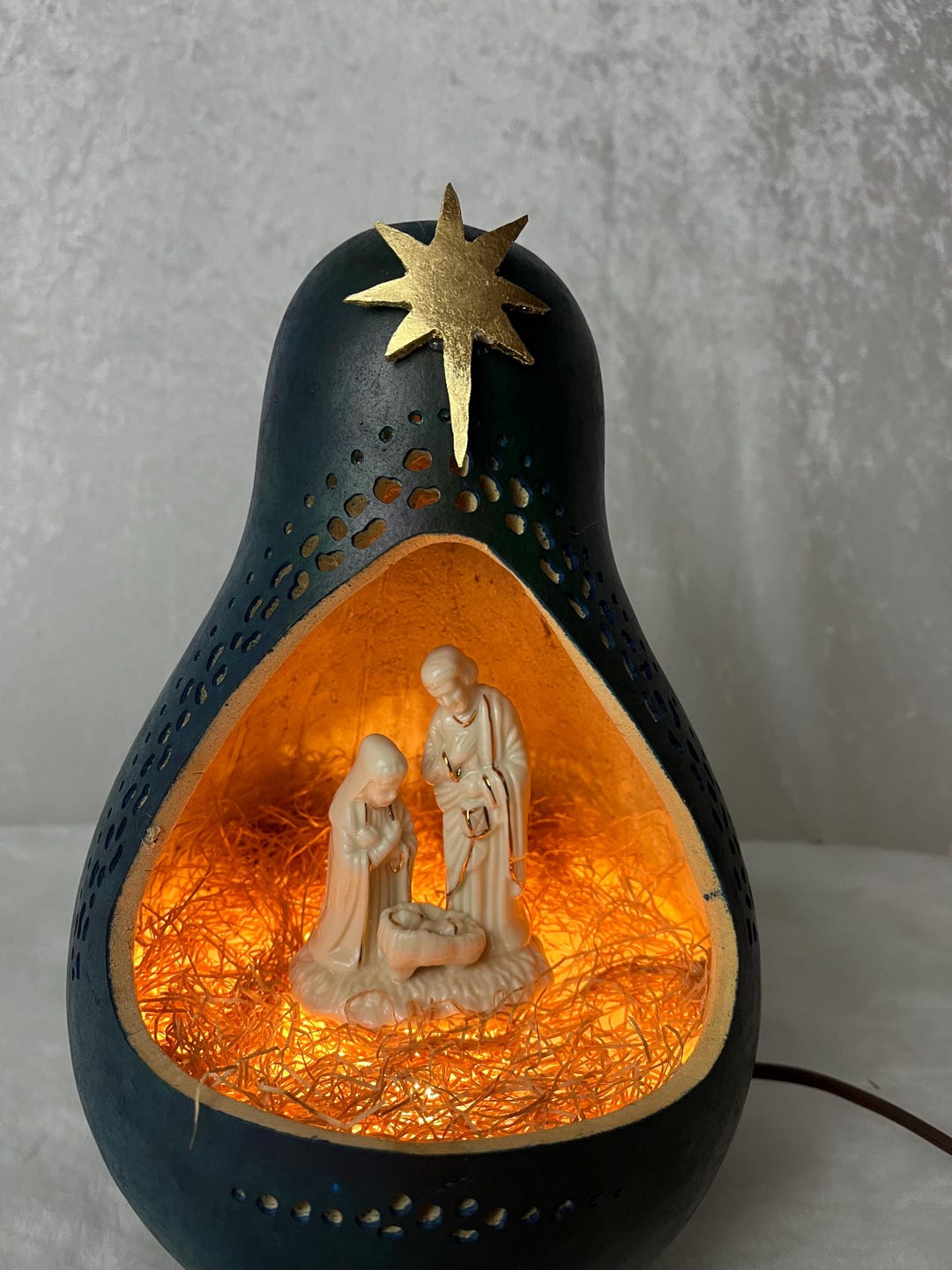 Nativity Scene Inside a Filigree Carved Gourd, Illuminated With a Small ...