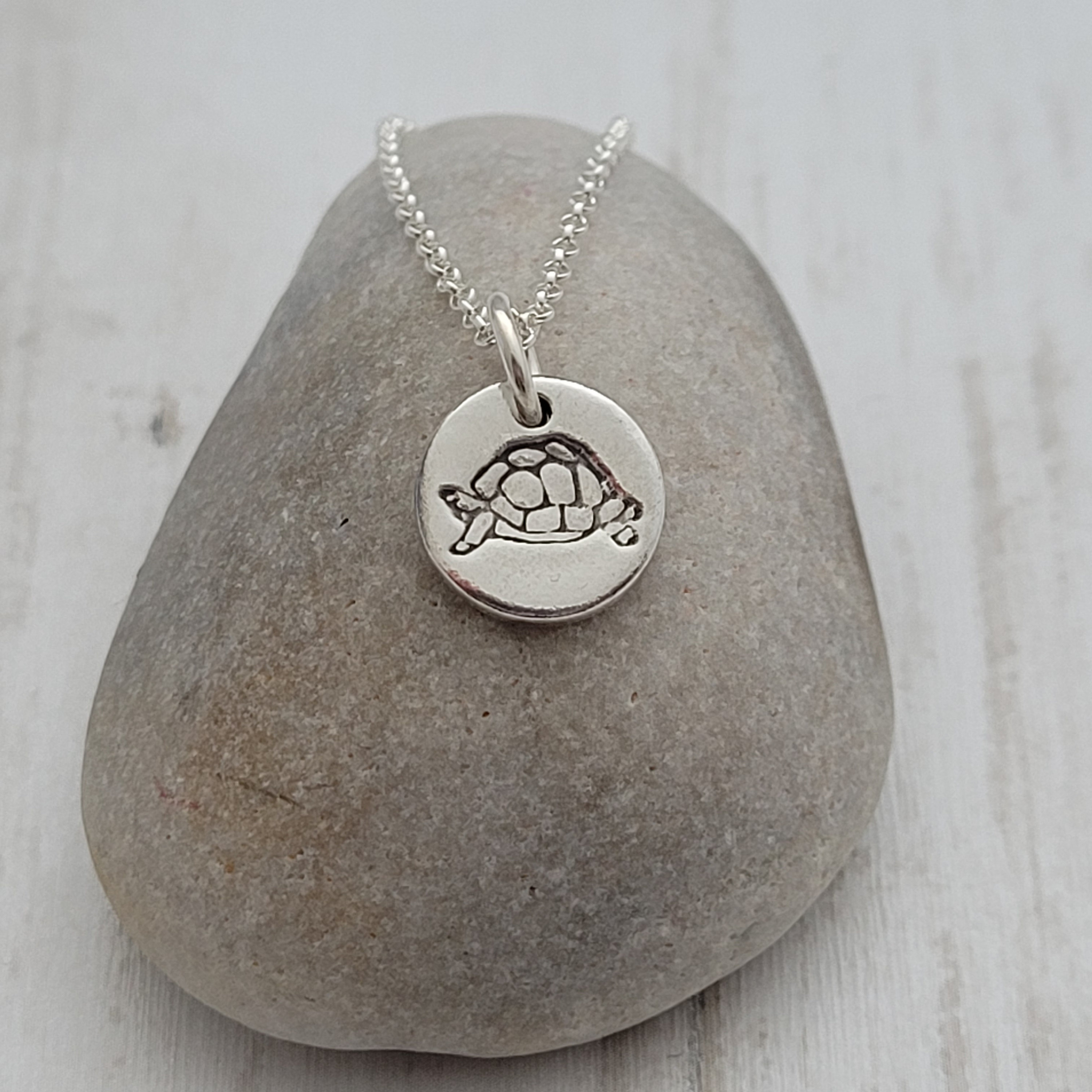 Tortoise pendant store