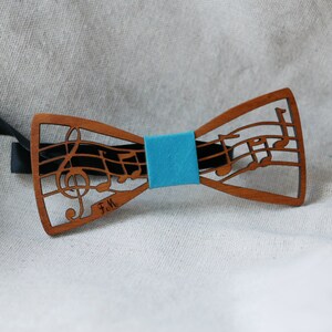 Music Wood Bow Tie, Musical Notes and Treble Clef on a Wooden Partition ...