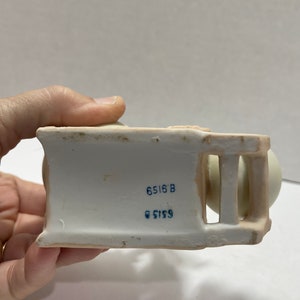 Cherub Decorated Egg Shells Applied Flower on Sled 6516 - Etsy