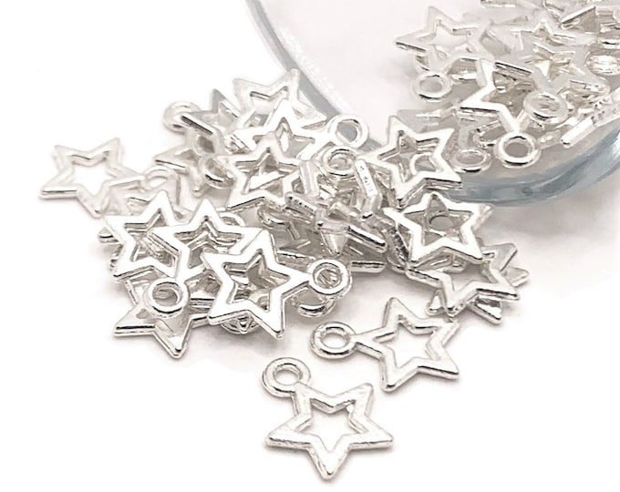 Tiny Sterling Silver Whimsical Artisan Star Charms set of 2 - Etsy