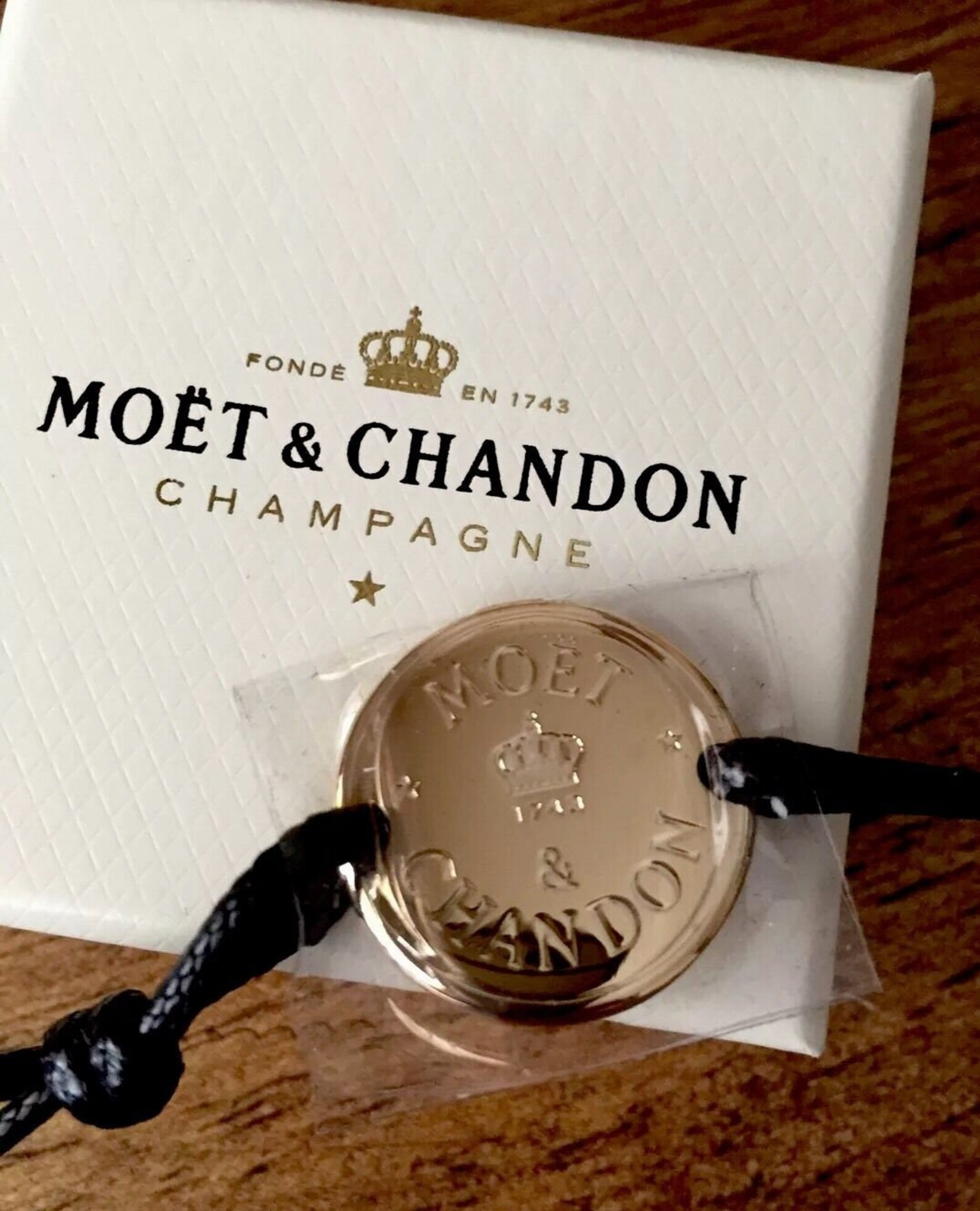 Moet Chandon Champagne Corded Gold Tone Disc Bracelet in Branded Moet ...