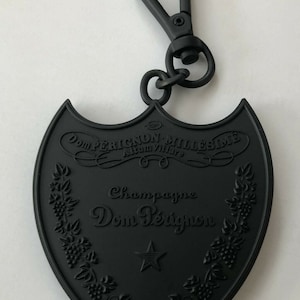 DOM PERIGNON Champagne Pewter Metal Tradmark Shield KEYRING Handbag ...