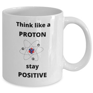 Science Physics Coffee Mug - Think Like a Proton Stay Positive - Funny ...