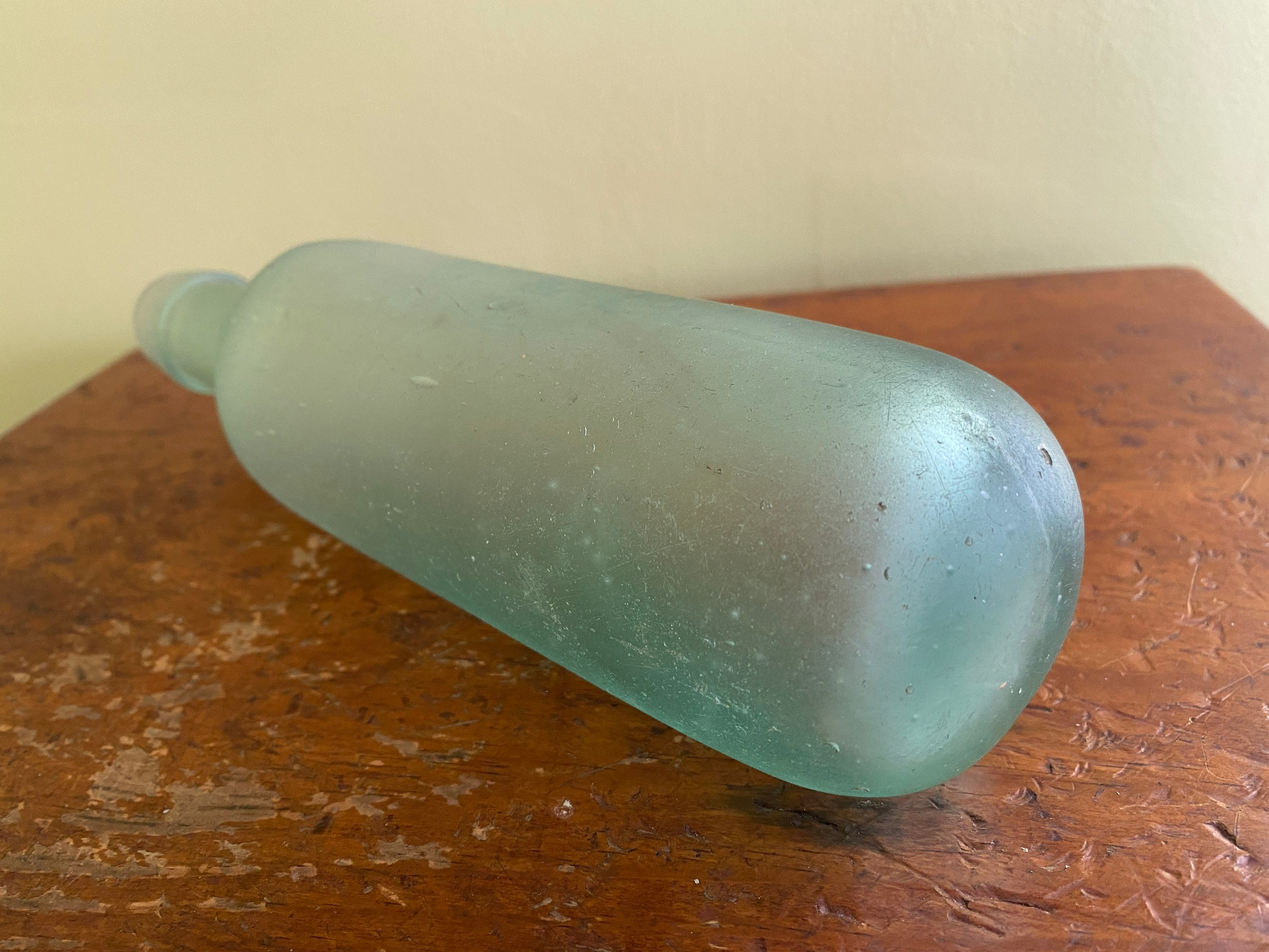 Antique Glass Torpedo Bottle