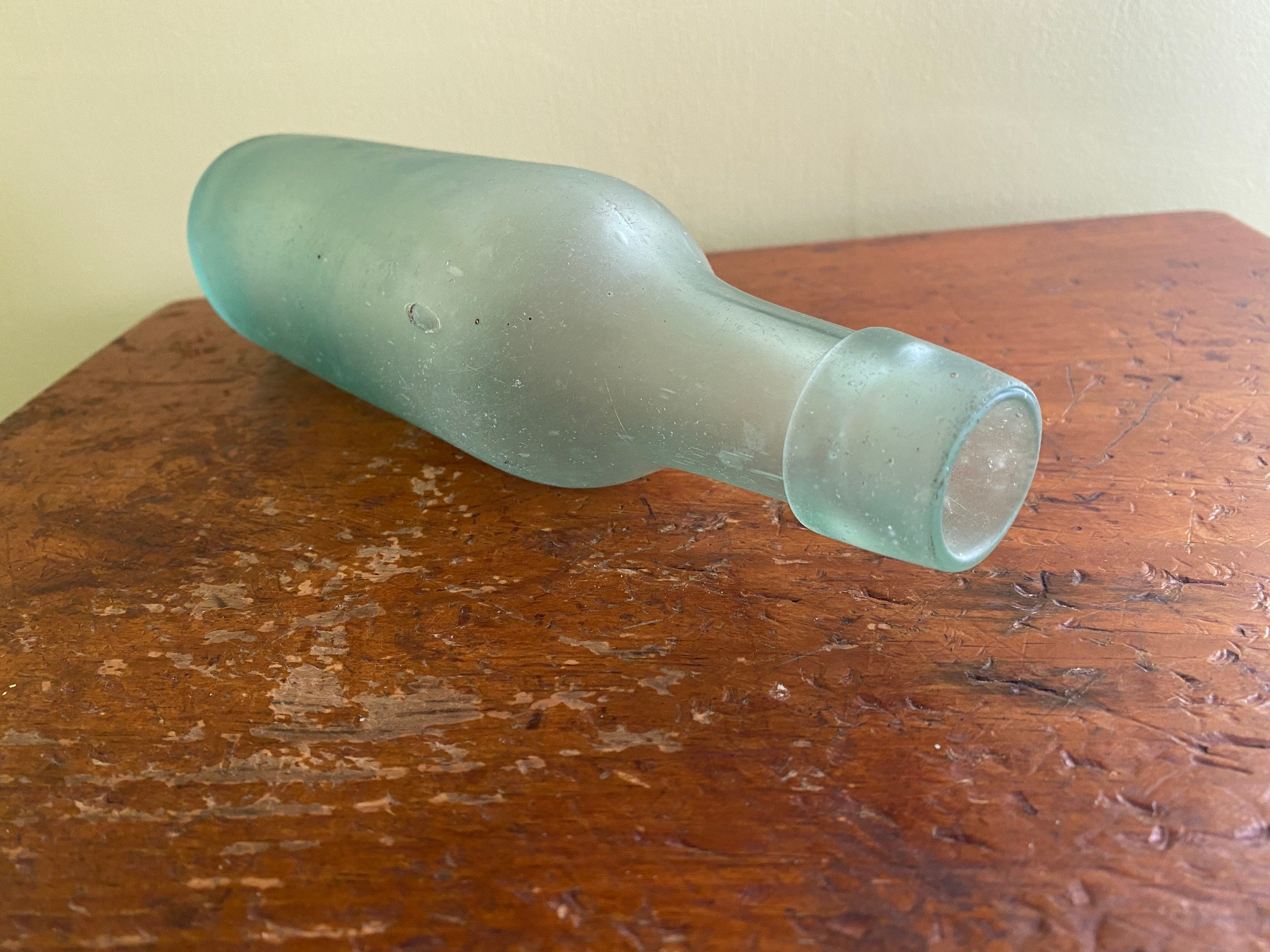 Antique Glass Torpedo Bottle