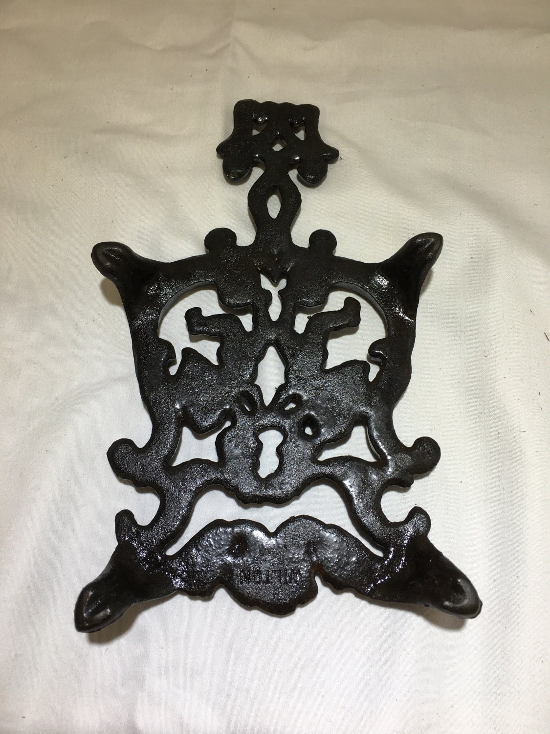 Vintage Wilton Cast Iron Cherub Trivet