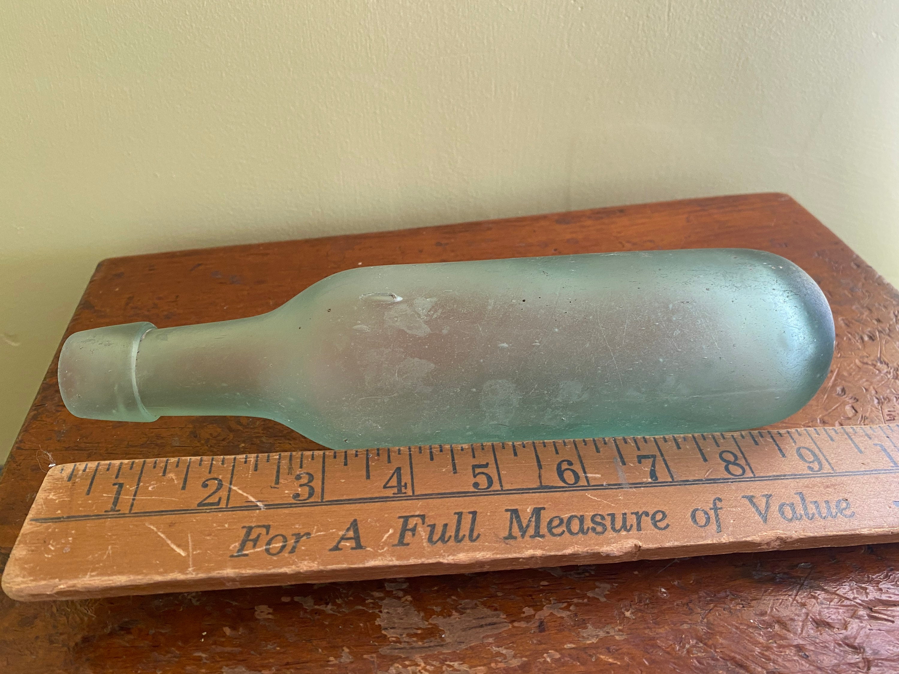 Antique Glass Torpedo Bottle