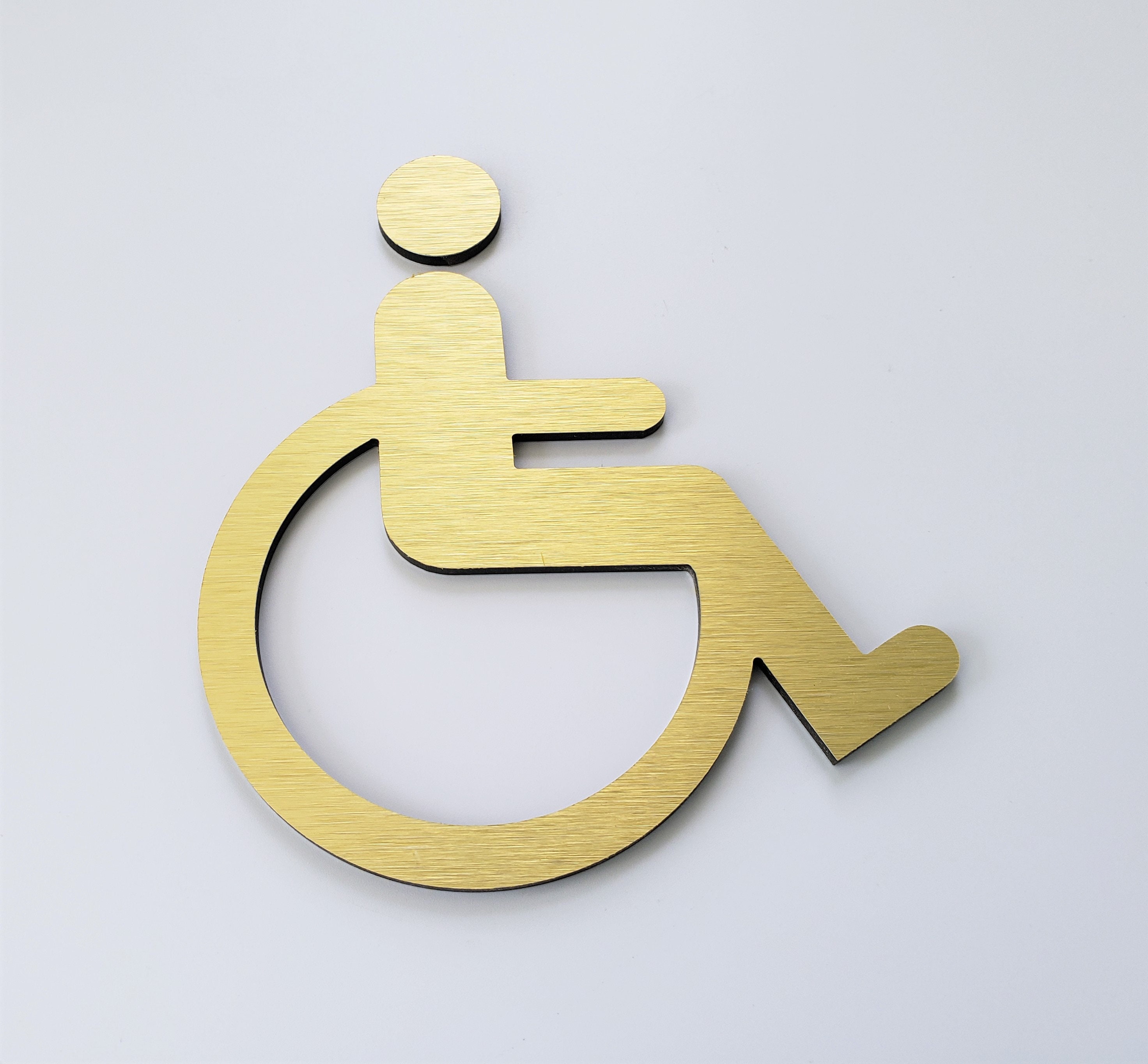 Metal handicap figure. Handicap symbol. Bathroom door sign. Fitting ...