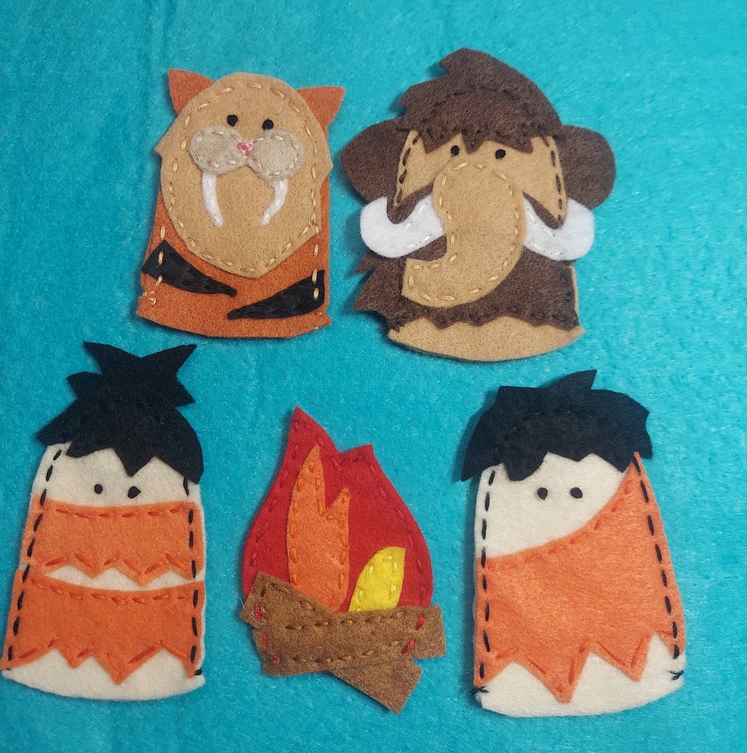 Wooly Mammoth, Sabertooth Tiger, Caveman Boy and Girl and Fire Finger ...
