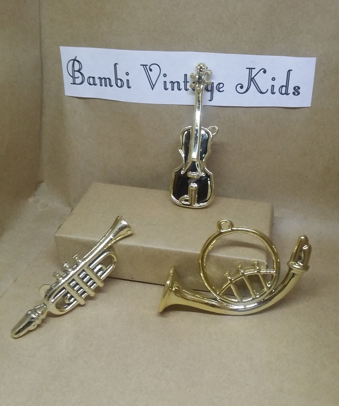1 Vintage Small Gold Instruments, Plastic French Horn,gold Cello or ...