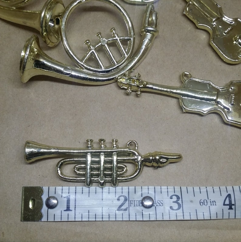 1 Vintage Small Gold Instruments, Plastic French Horn,gold Cello or ...
