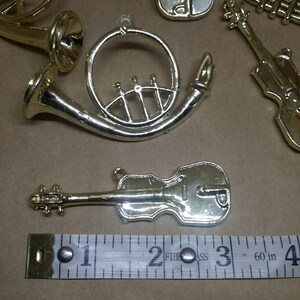 1 Vintage Small Gold Instruments, Plastic French Horn,gold Cello or ...