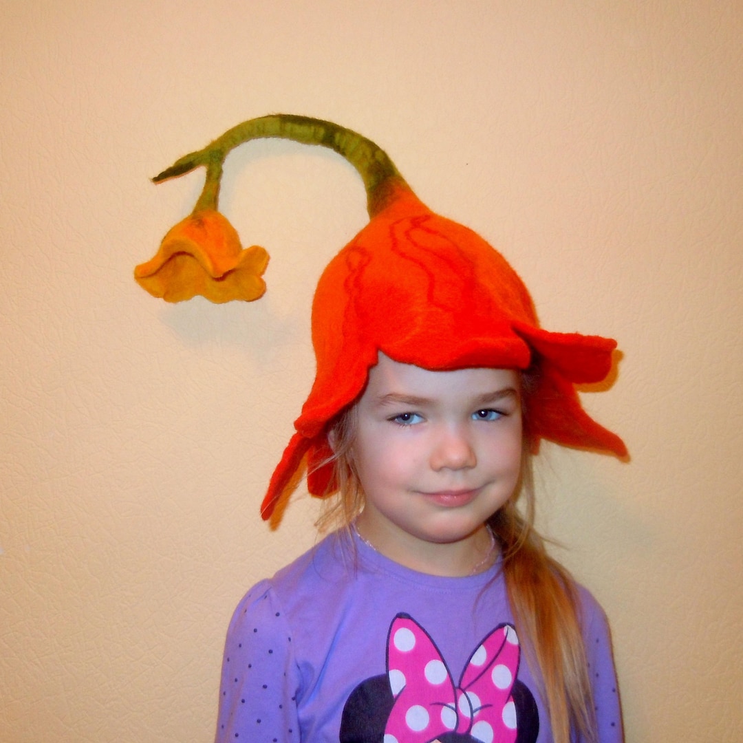Beautiful Bell Shaped Hat With a Little Yellow Flower at the End Flower ...