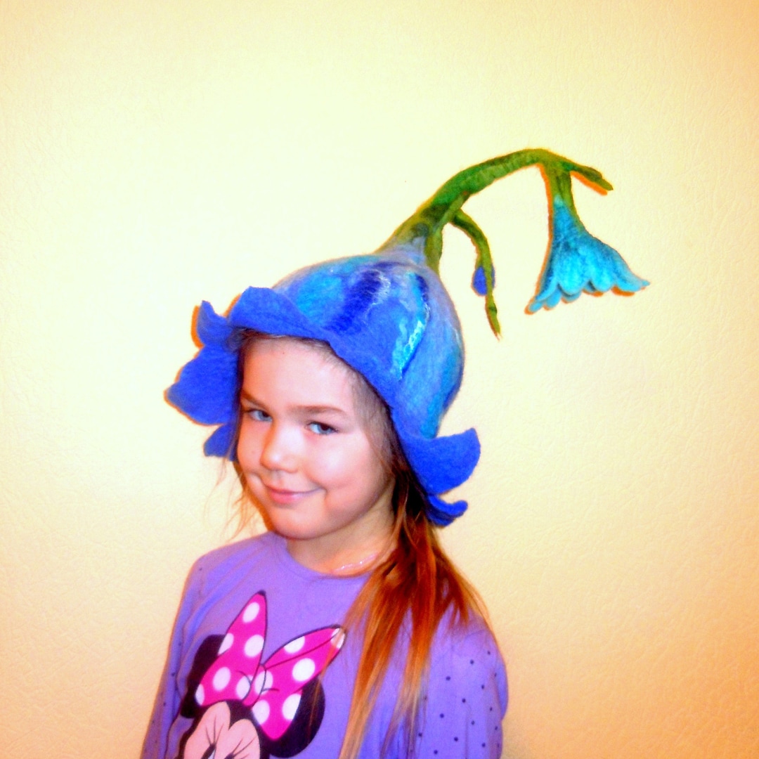 Beautiful Blue Bell Shaped Hat With a Little Flower at the End Flower ...