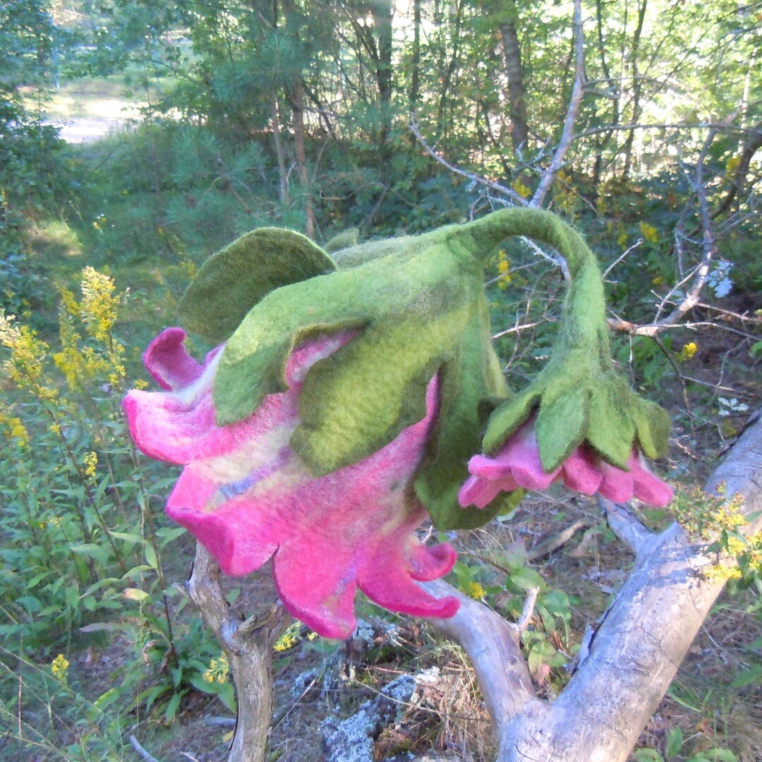 Pink Beautiful Bell Shaped Hat With a Little Flower at the End Flower ...