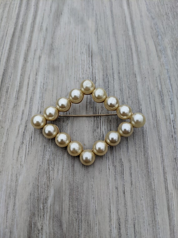 gold tone metal diamond - Gem